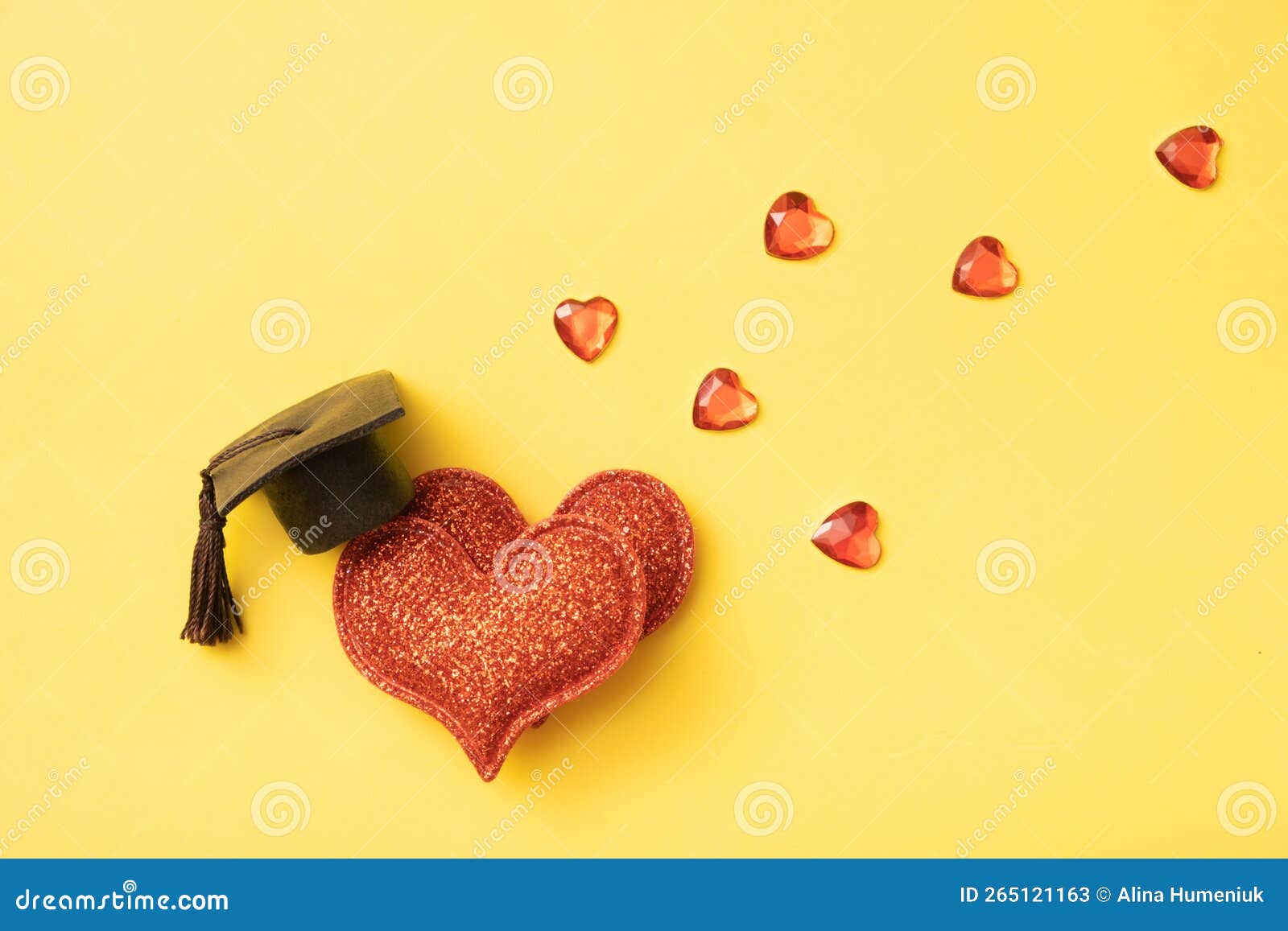 Graduated Hat with Two Shiny Hearts on a Yellow Background. the Concept ...
