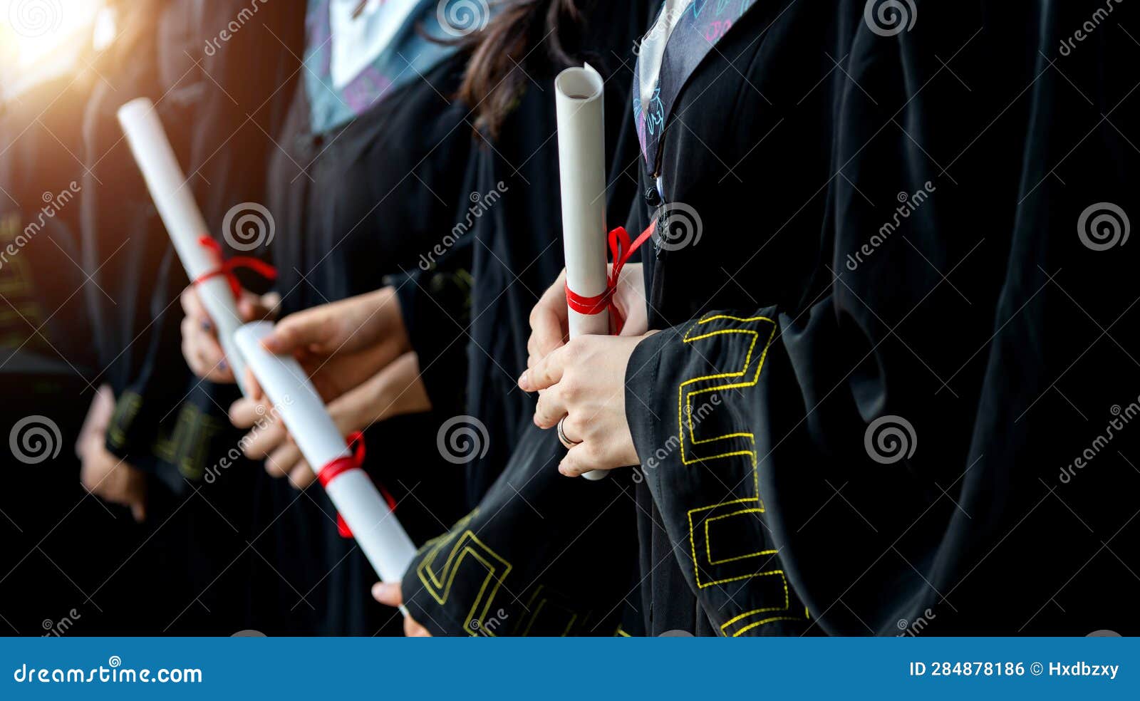 Students Holding Diplomas in a Line Stock Photo - Image of college ...