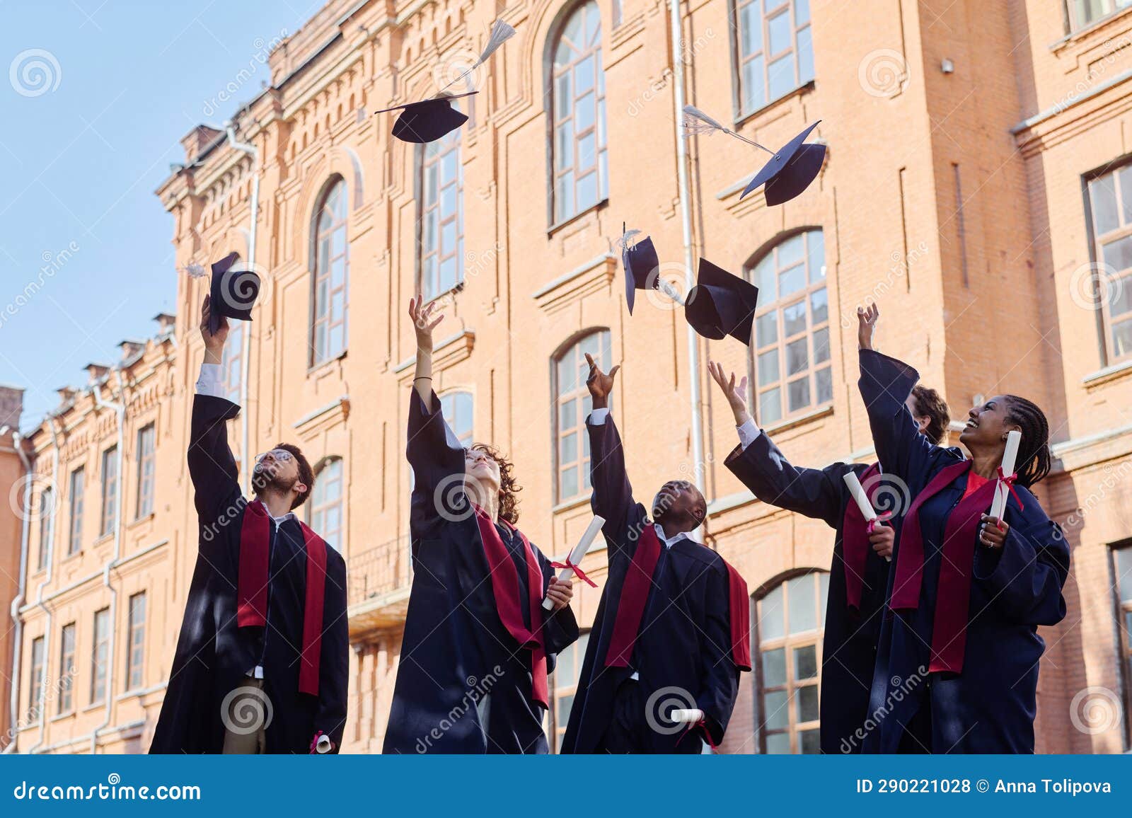 Graduated Students Throwing Their Hats Stock Photo - Image of smile ...
