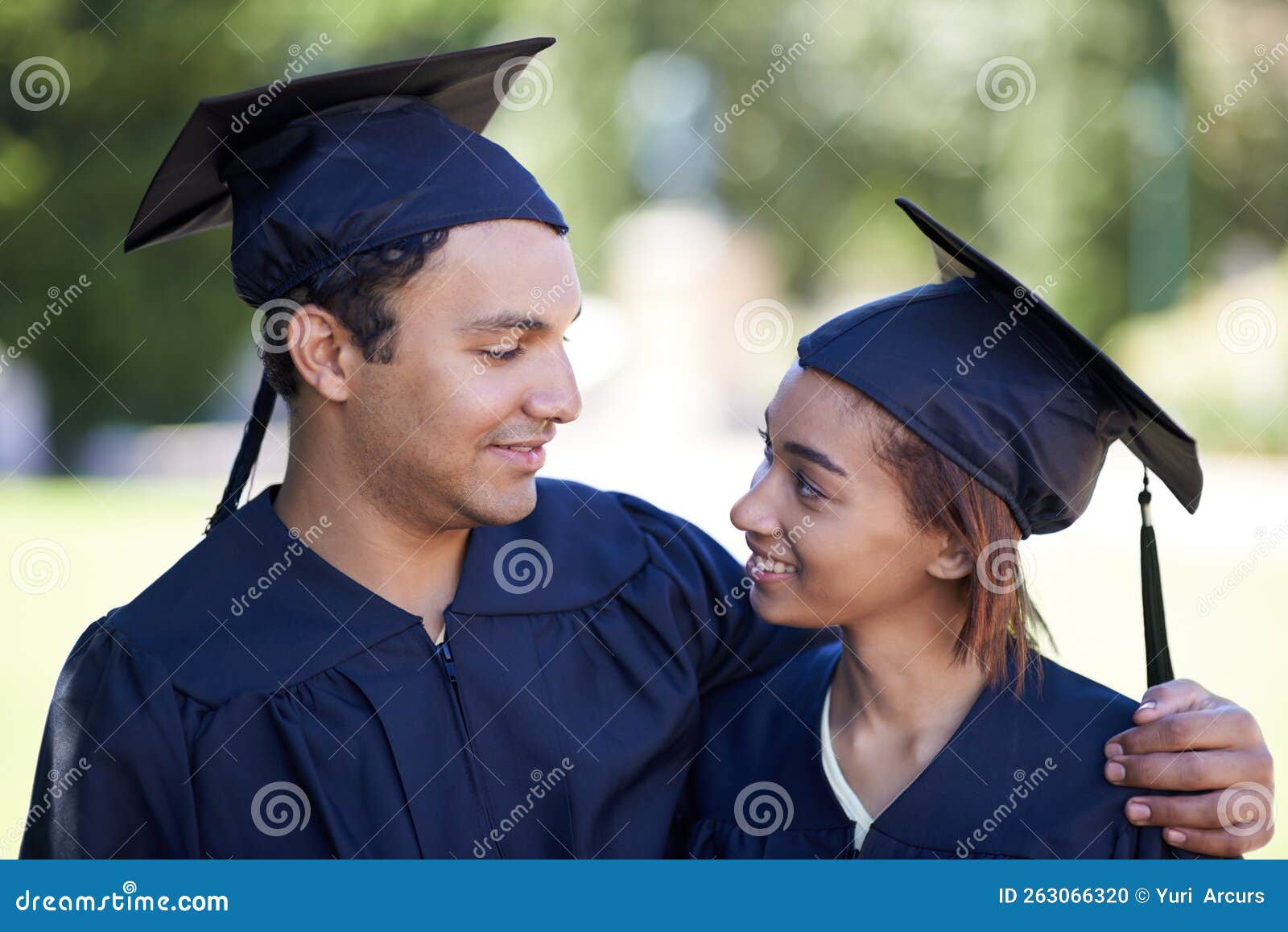 We Graduated Together. a Happy Couple Graduating Together. Stock Photo ...