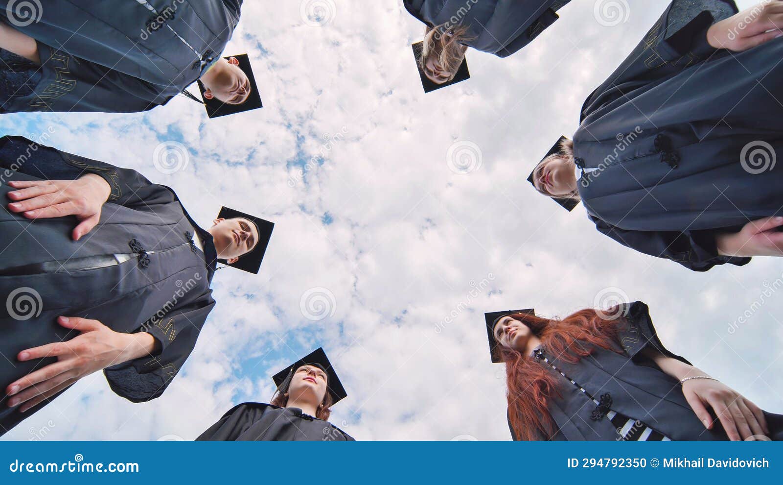 Graduates in Black Robes Stand in a Circle. Stock Photo - Image of ...