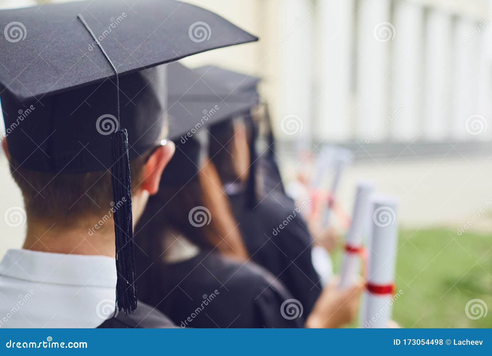 Graduates with Diplomas in Front of the University. Editorial Stock ...