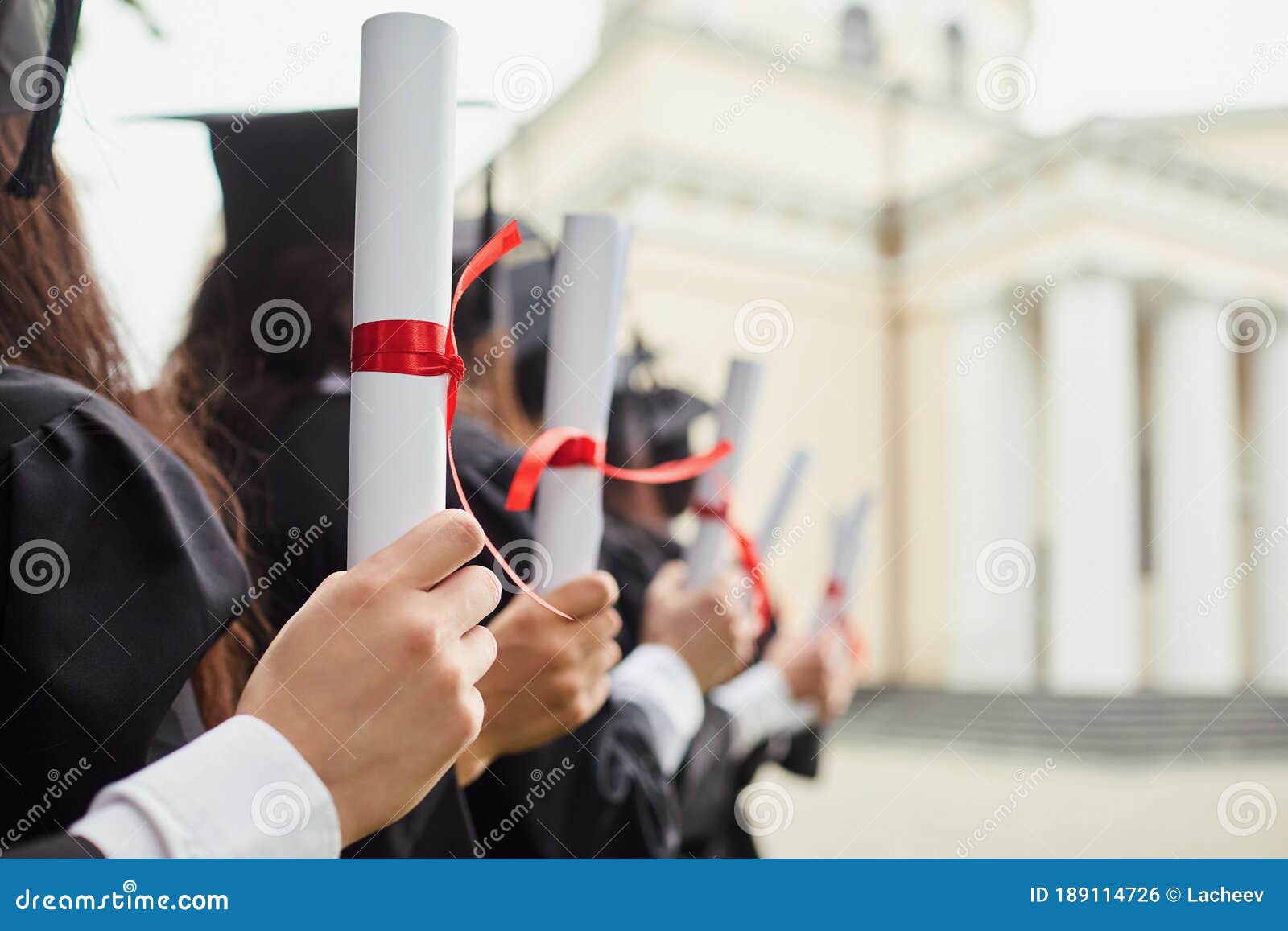 Graduates with Diplomas in Front of the University. Stock Photo - Image ...