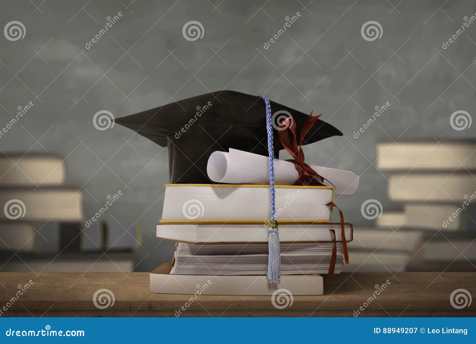 Graduation Cap Above Stack Books with Degree Paper Stock Image - Image ...