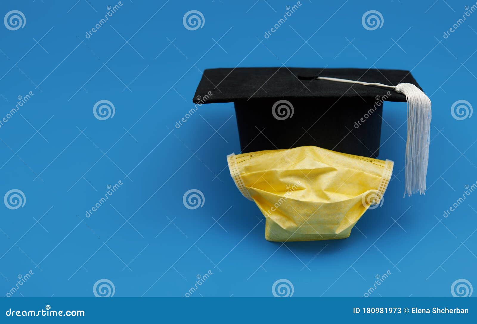 Graduation Cap and Face Shield on Blue Stock Image - Image of black ...