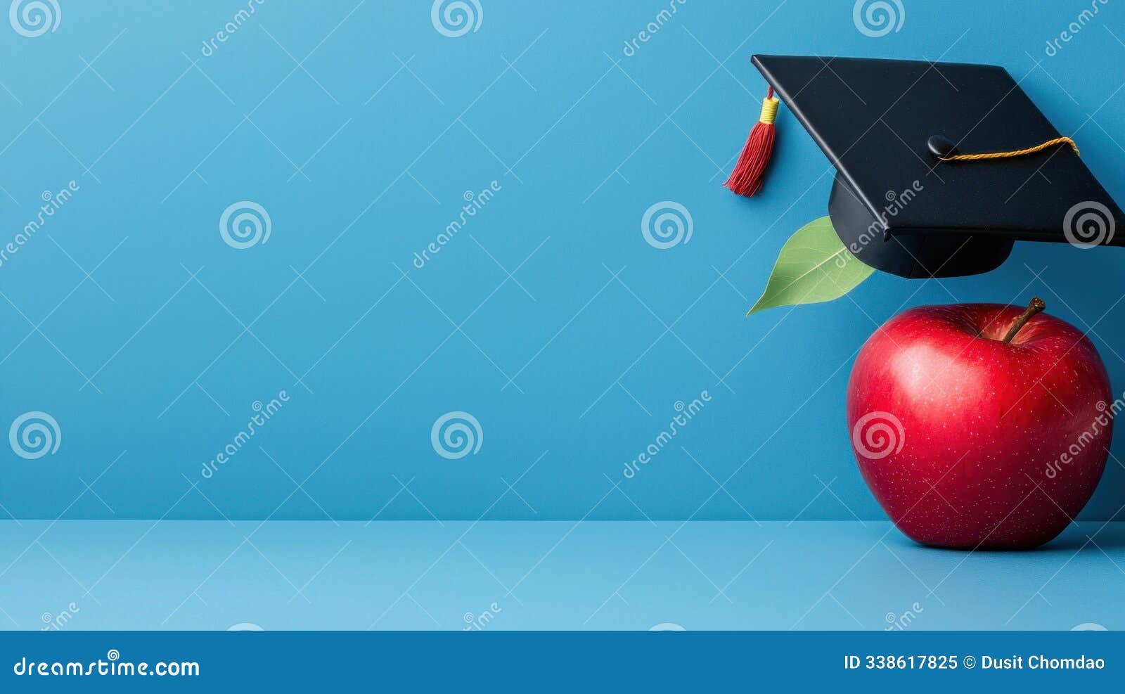 Graduation Cap and Red Apple Symbolize Education and Achievement Stock ...