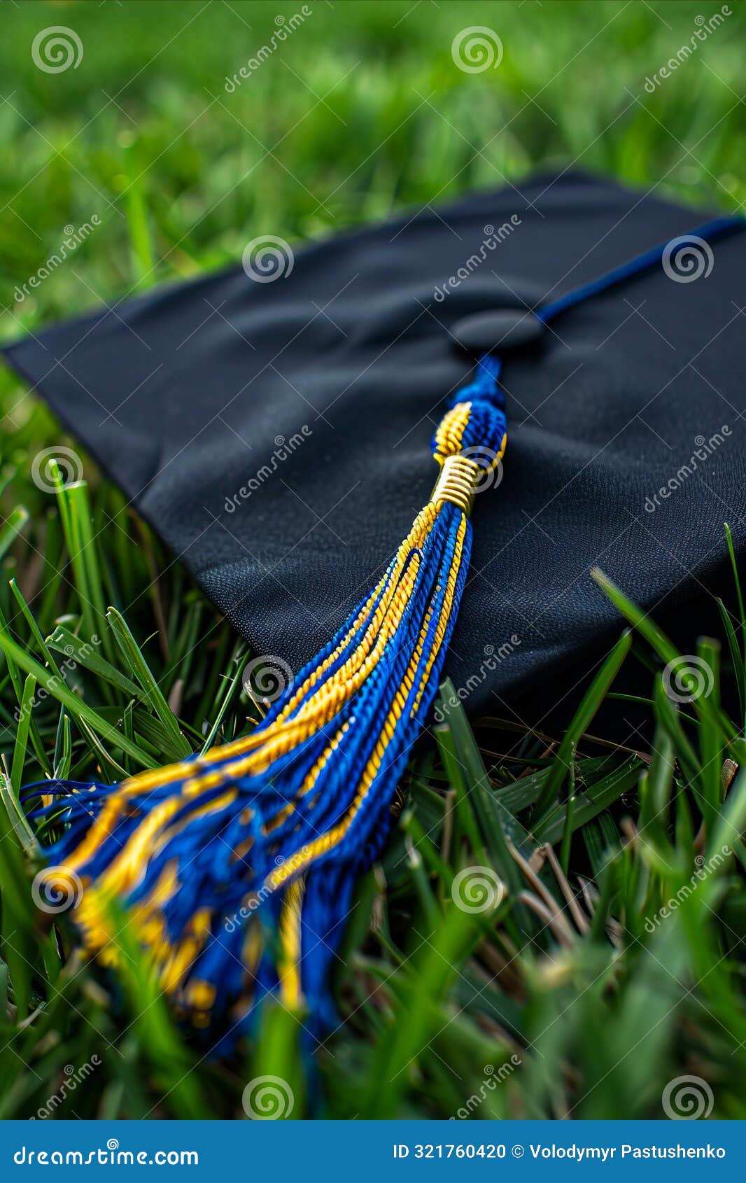 A Graduation Cap and Tassel on the Grass Stock Photo - Image of black ...