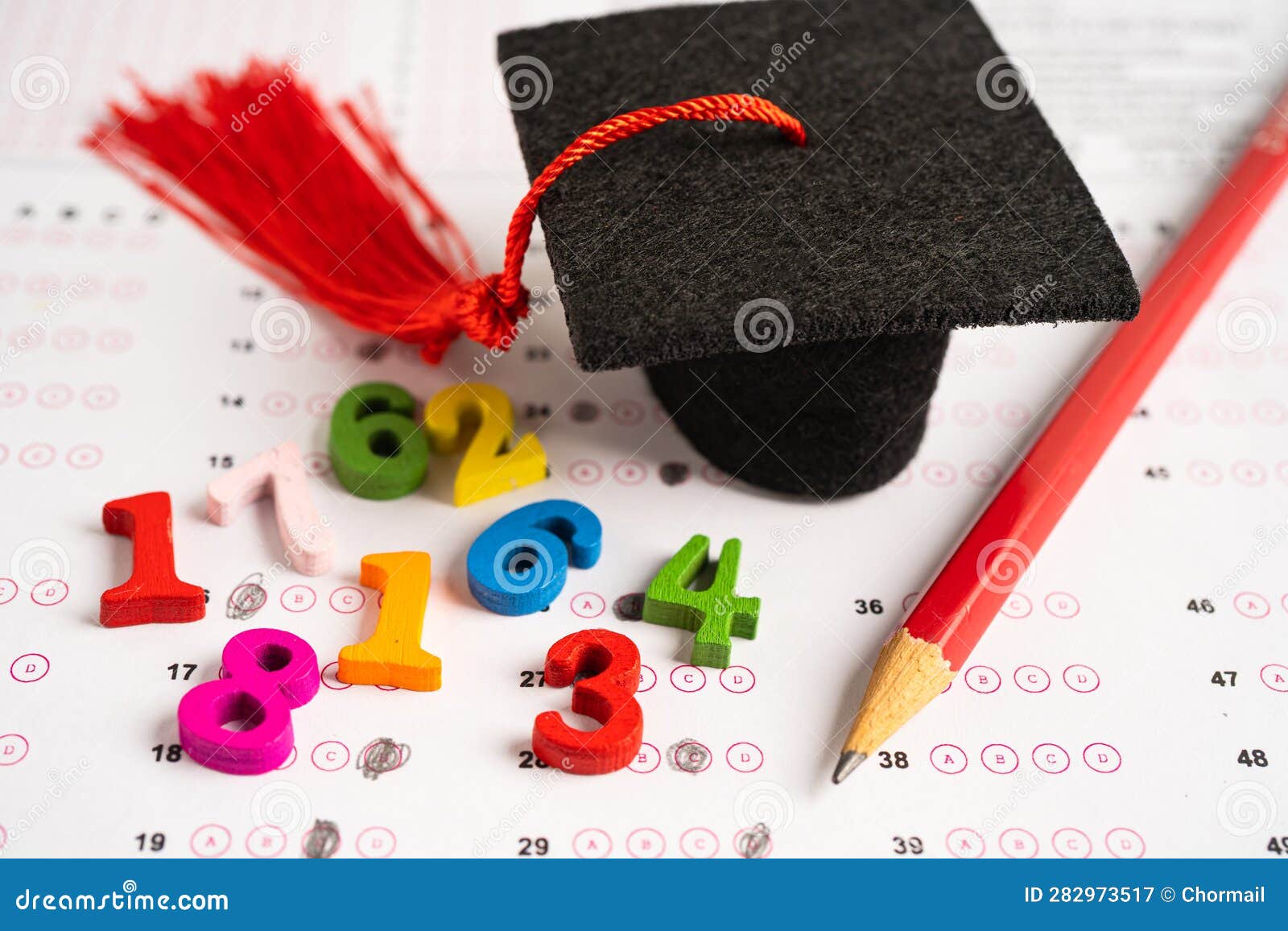 Graduation Gap Hat and Pencil on Answer Sheet Paper, Education Study ...