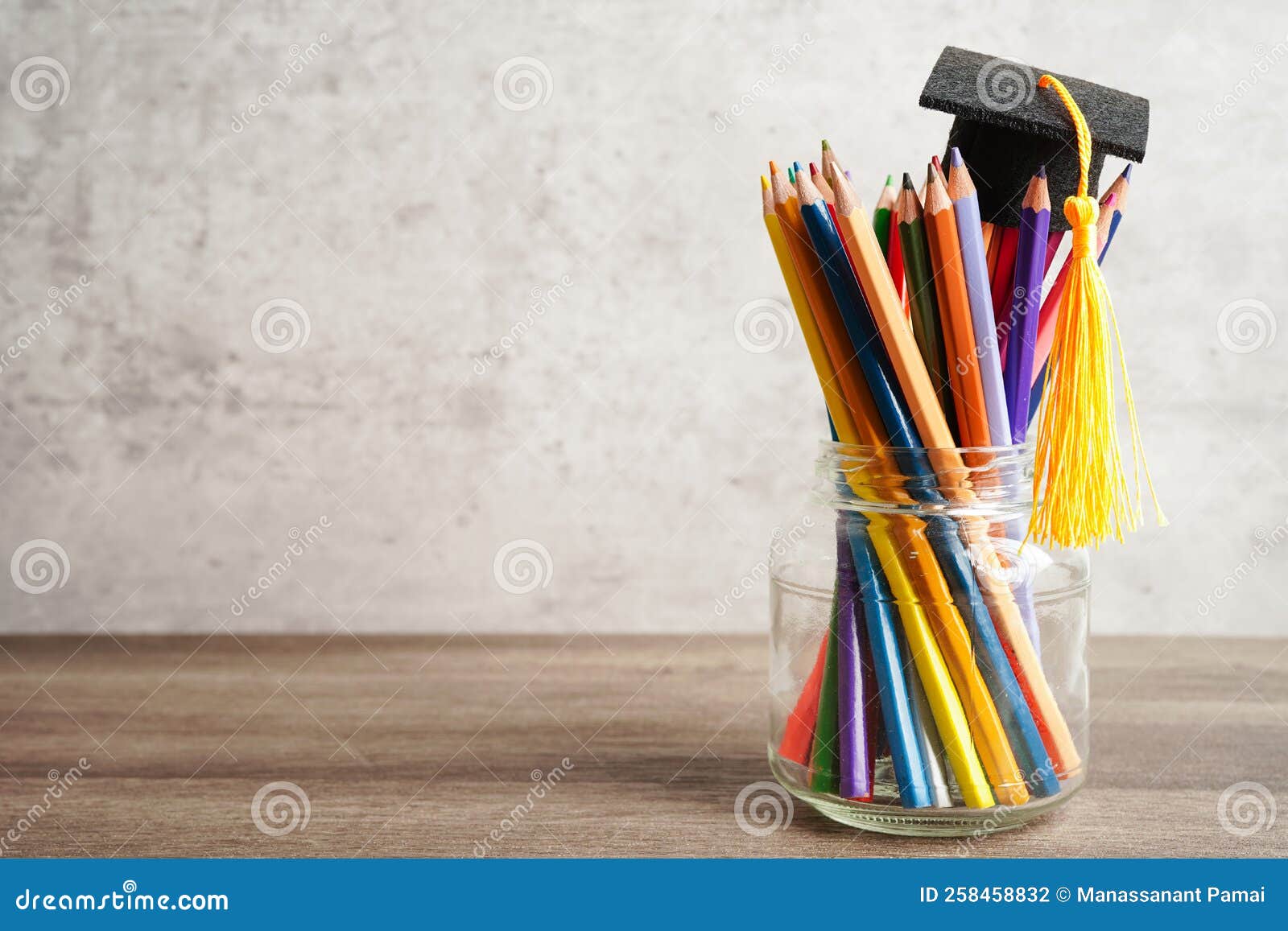 Graduation Hat with Colorful Pencils on Book with Copy Space, Learning ...