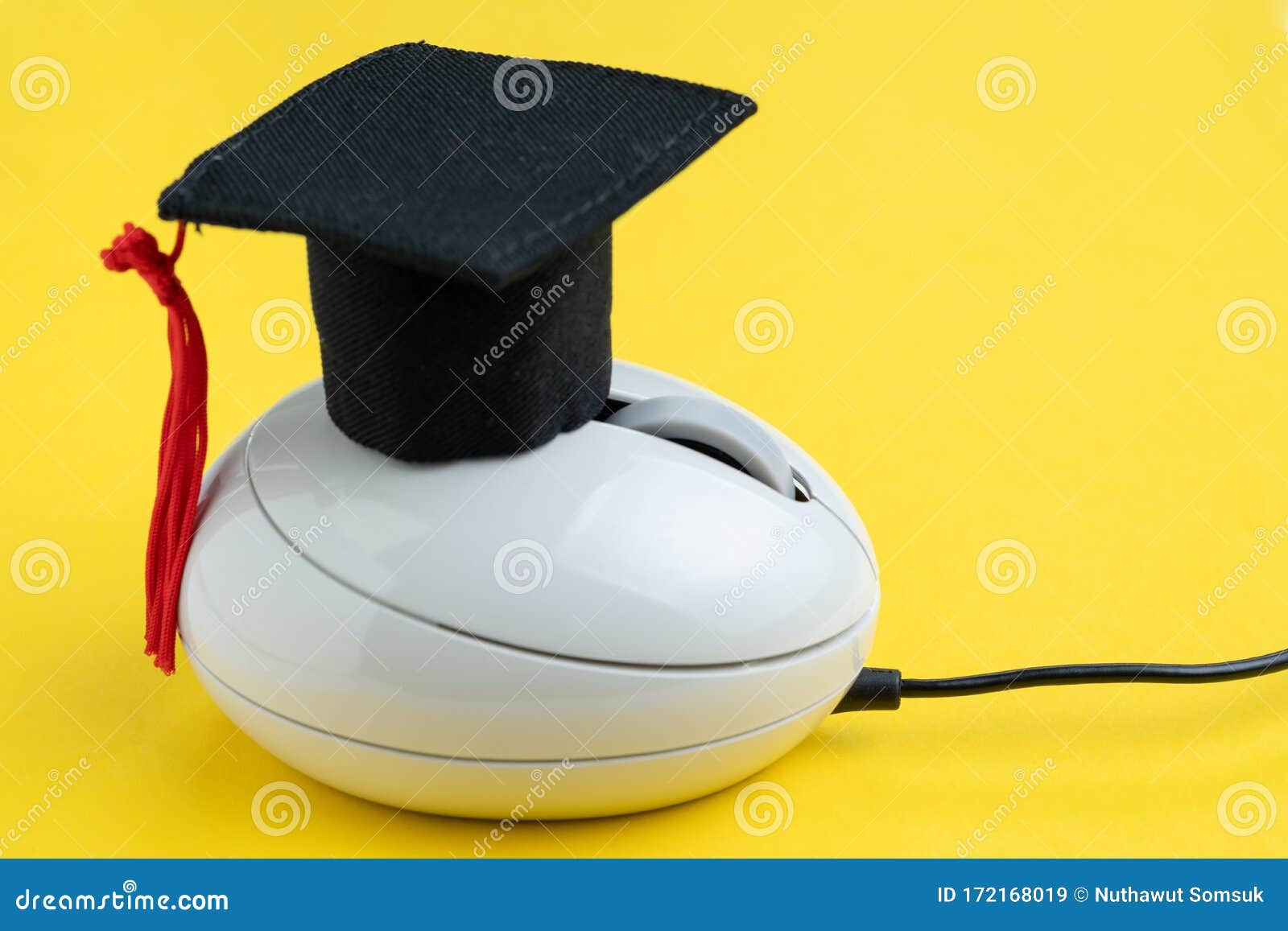 Graduation Hat on Computer Mouse on Solid Yellow Background Using As ...