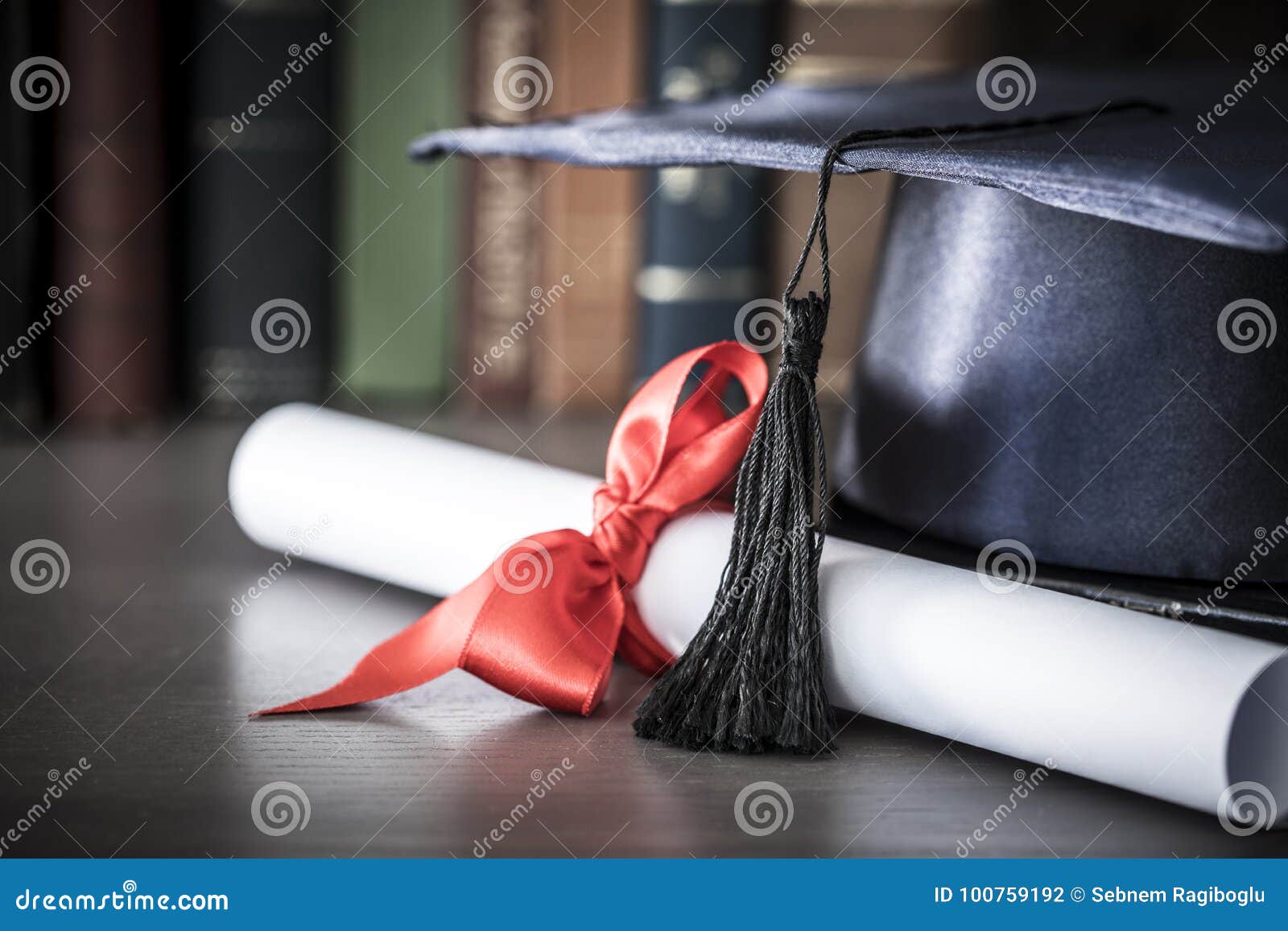 Graduation Hat and Diploma on Table Stock Photo - Image of table ...