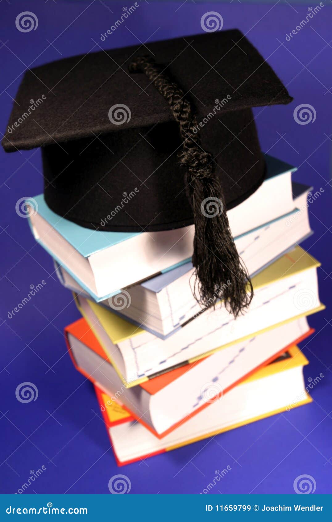 Graduation Hat on a Stack of Books Stock Image - Image of commencement ...