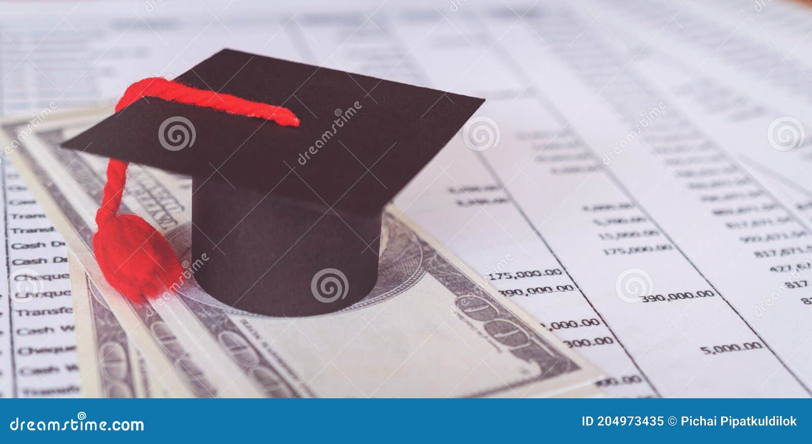 Graduation Hat on Statement. Statement for Education Finance Loan Stock ...