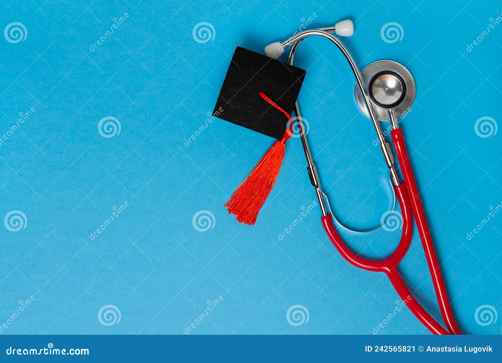 Graduation Medical Concetp. Graduation Cap and Stethoscope on Blue ...