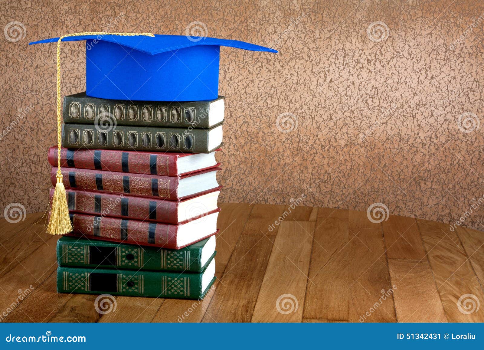 Graduation Mortarboard on Top of Stack of Books Stock Image - Image of ...