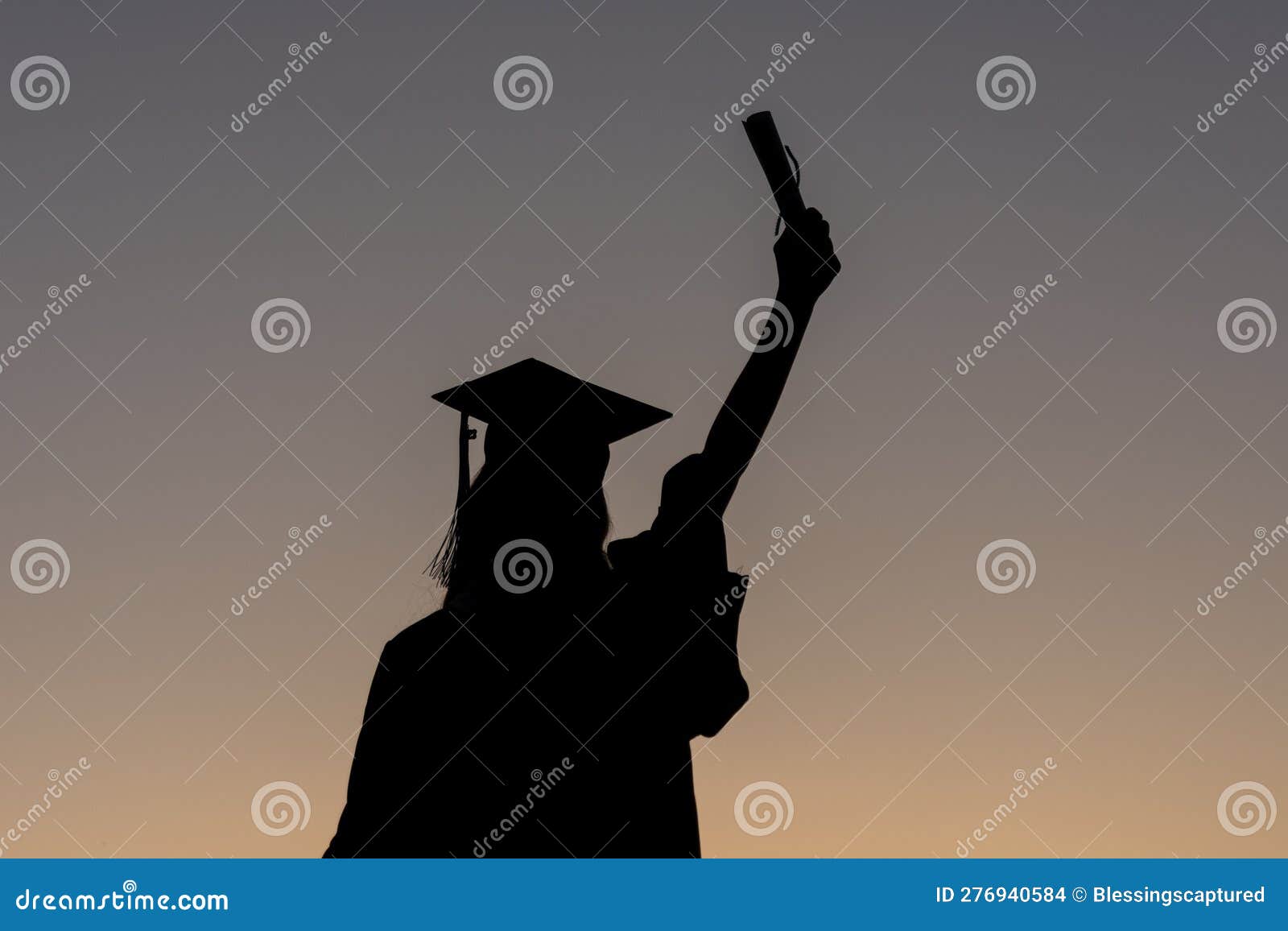 A Graduation Senior Celebrating at Sunset Stock Photo - Image of ...