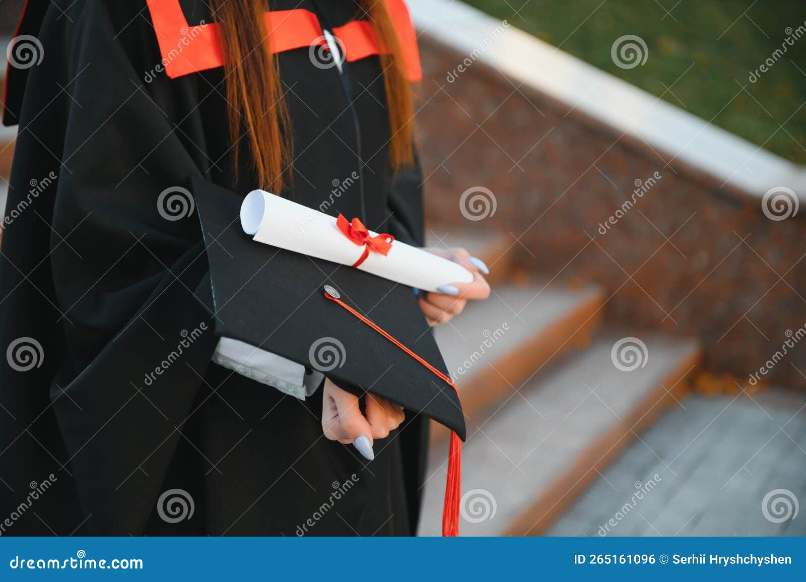 Graduation: Student Standing with Diploma Stock Photo - Image of gown ...