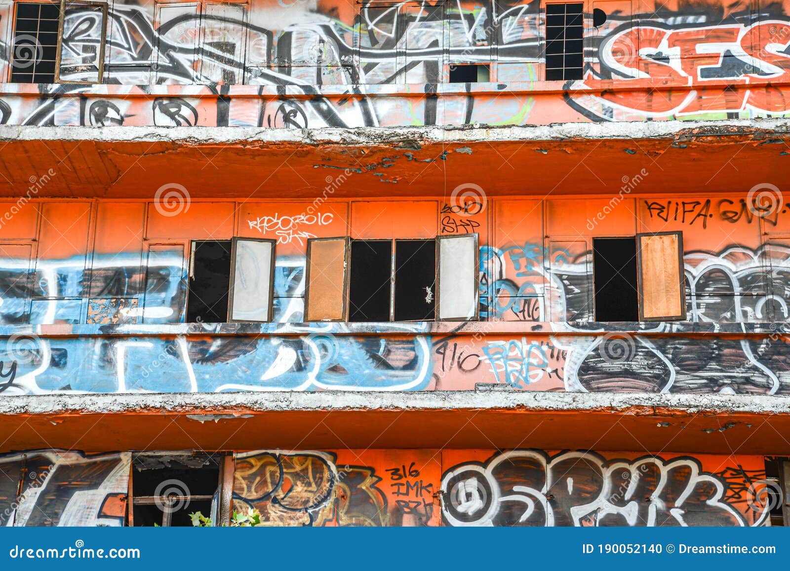 Graffiti Abandoned Building in Orange Editorial Image - Image of ...
