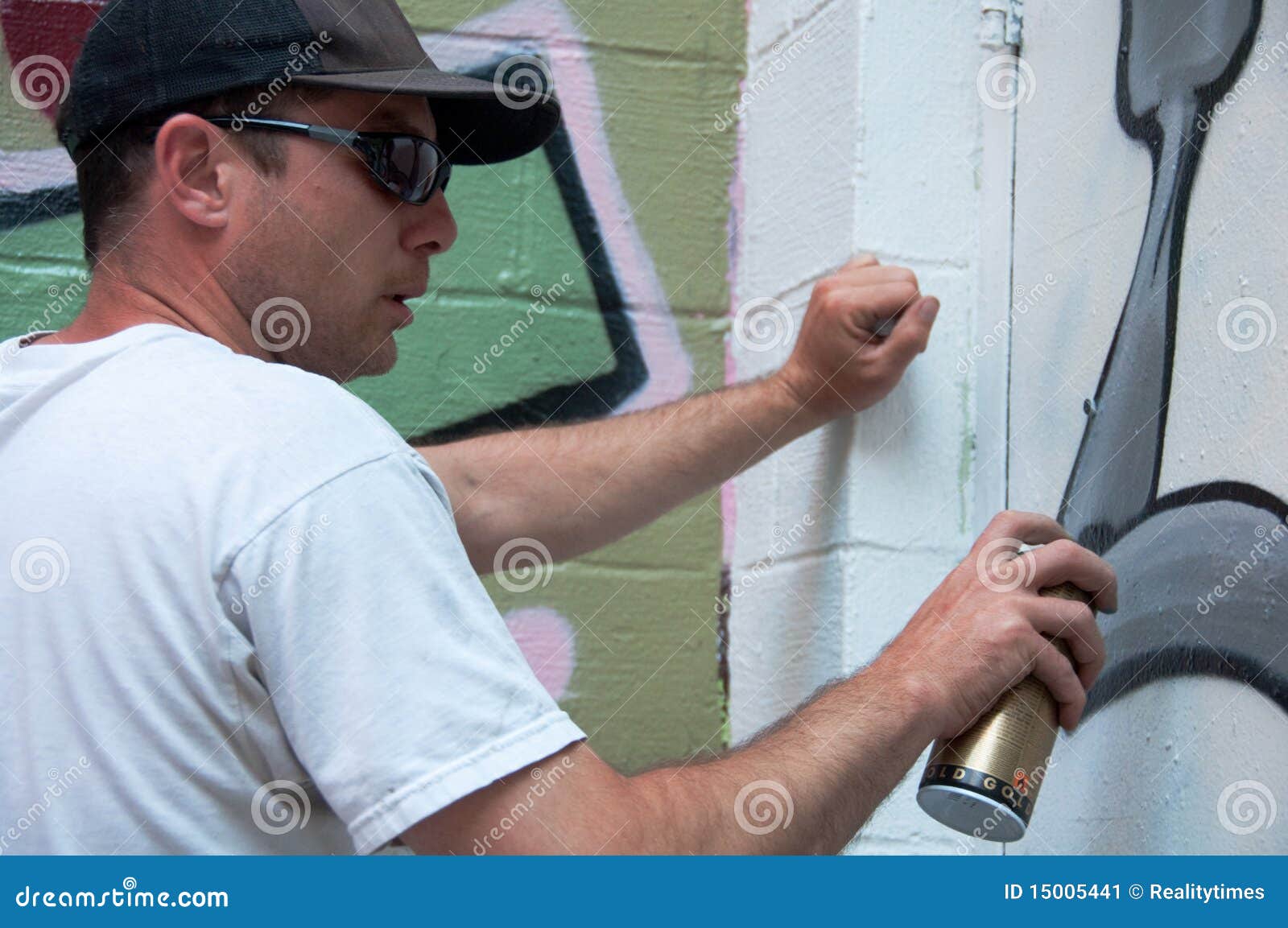 Graffiti Artist at Work on Mural Stock Image - Image of artist, wall ...