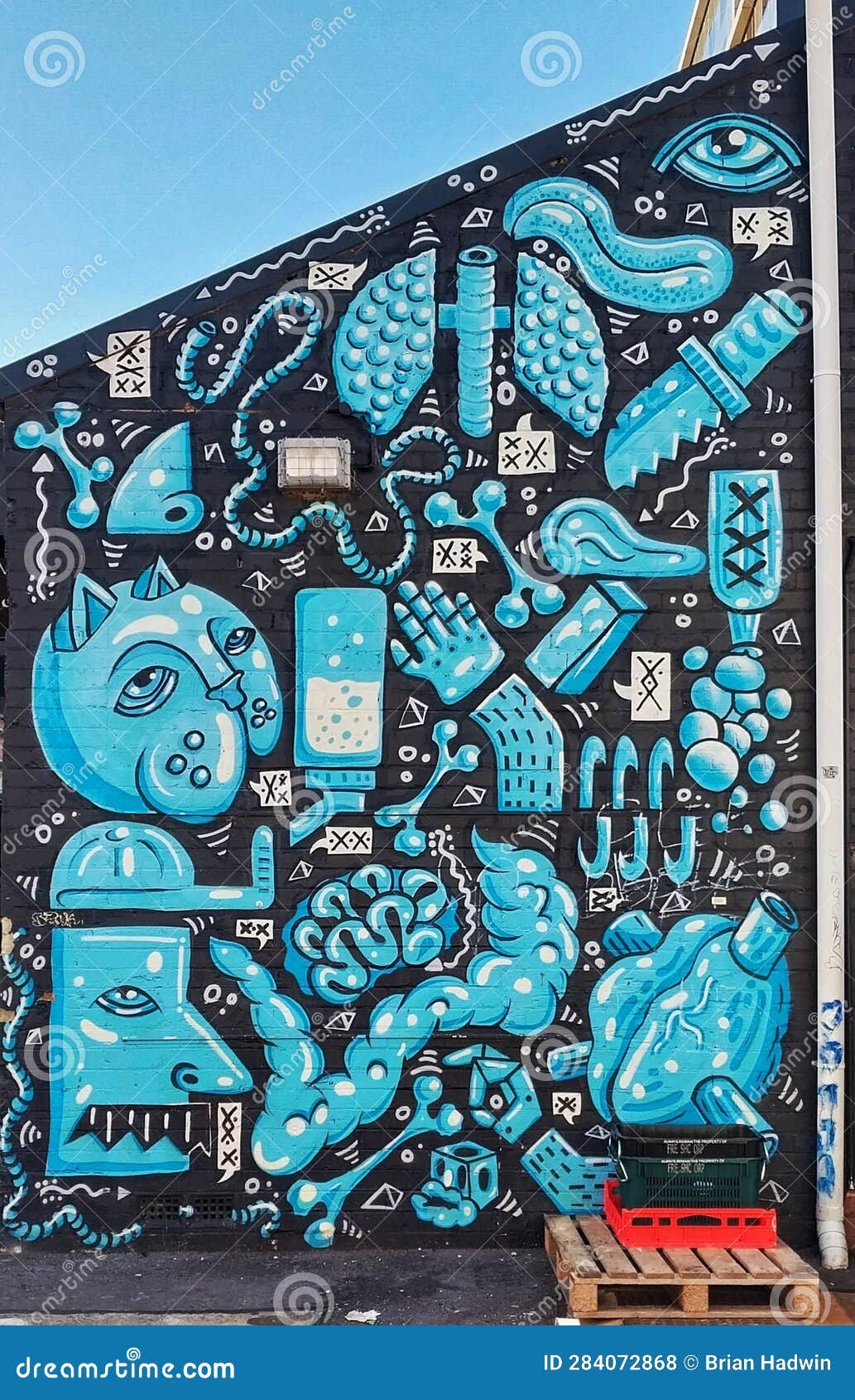 Graffiti blue graphic art editorial stock photo. Image of blue - 284072868