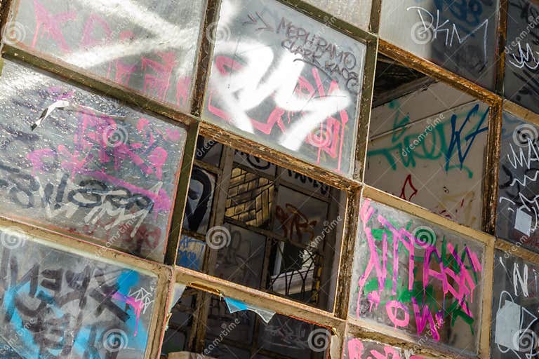 Graffiti on broken windows stock photo. Image of broken - 106120170