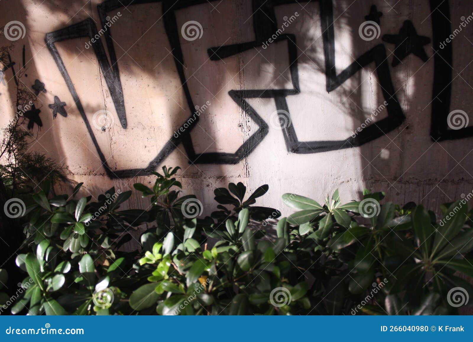 A Graffiti Covered Wall with Graffiti on it Stock Photo - Image of ...