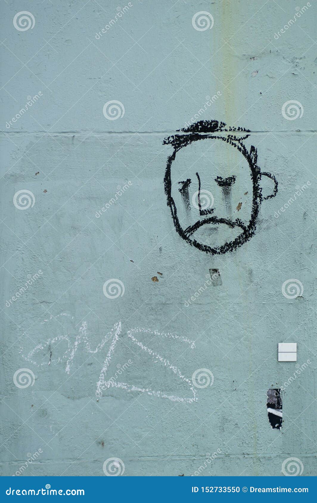 Graffiti, Face of a Sad Looking Man on a Wall Editorial Image - Image ...