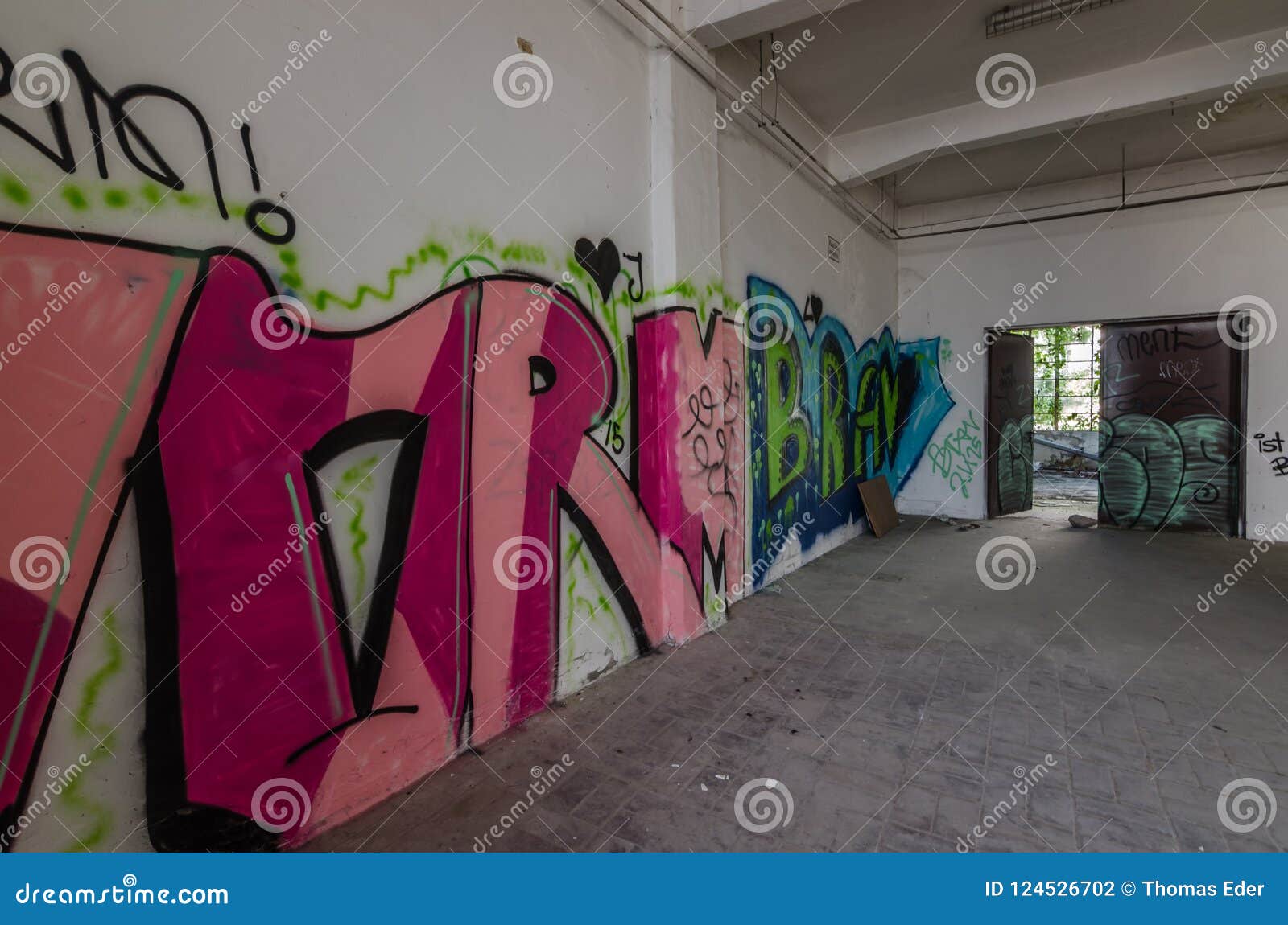 Graffiti in an factory editorial photography. Image of overgrown ...