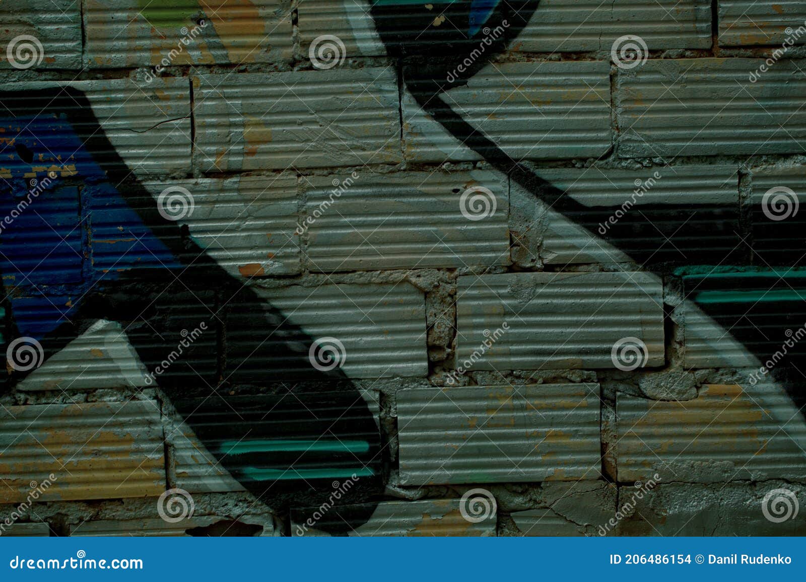 Graffiti Painted on Striated Bricks on a Wall Stock Photo - Image of ...