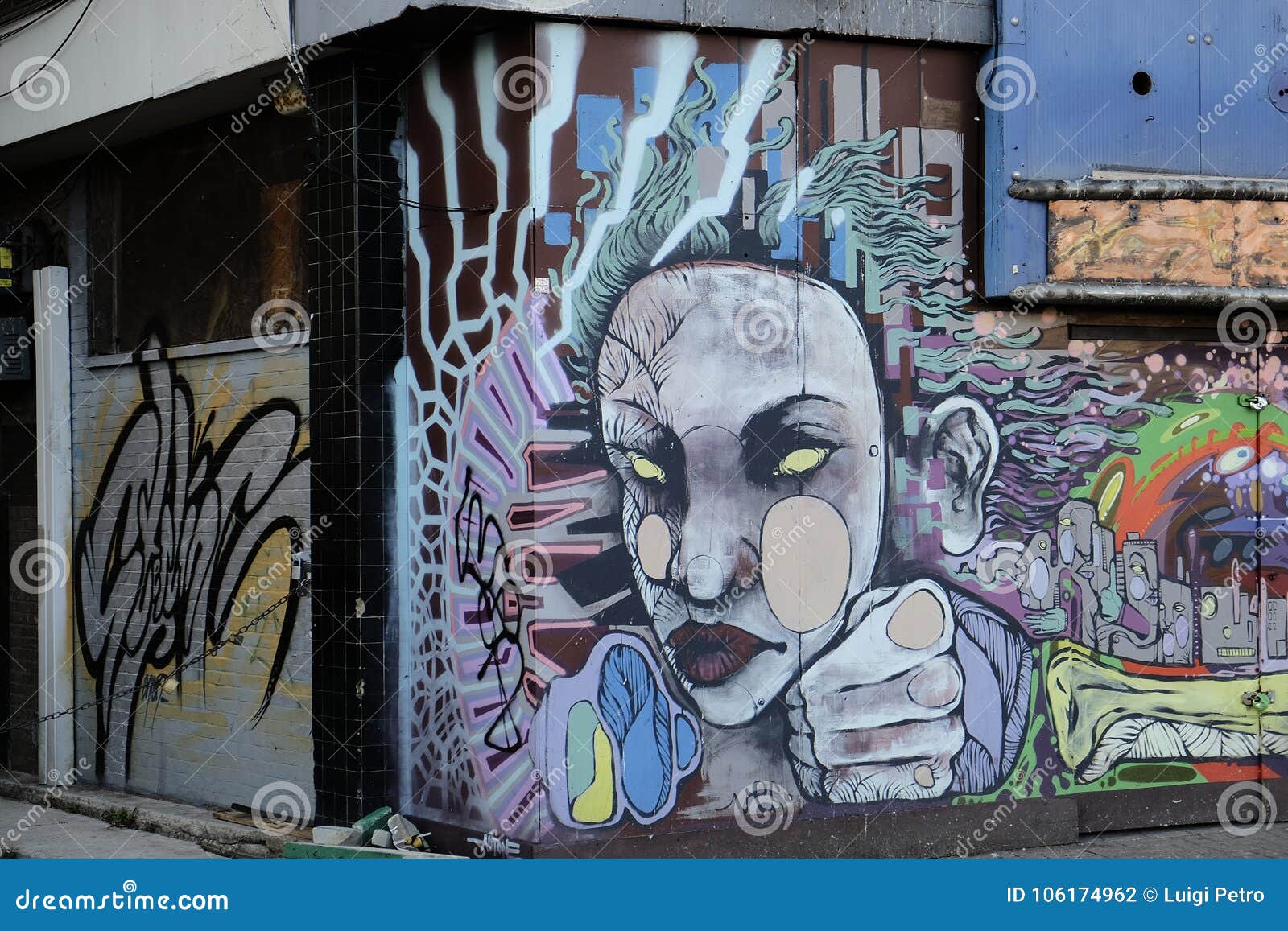 Graffiti on a Wall Showing a Human Face. Editorial Photography - Image ...