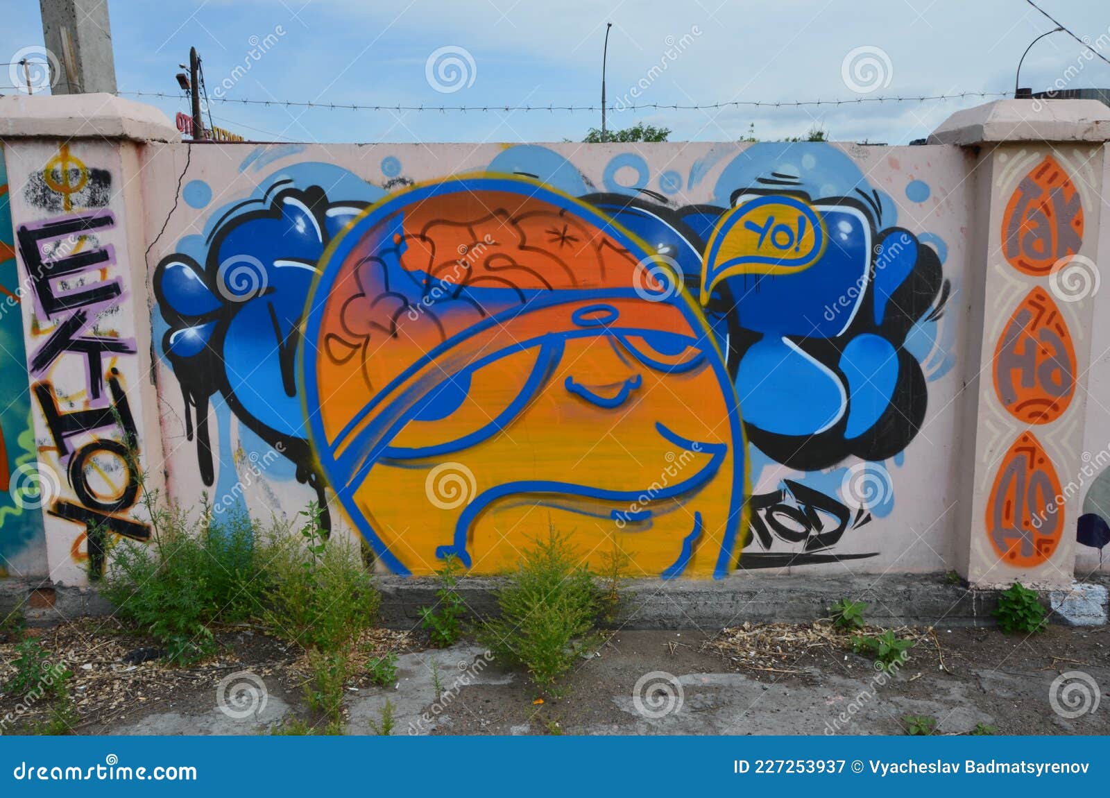 A Graffiti with a Sad Face on the Fence Editorial Photography - Image ...