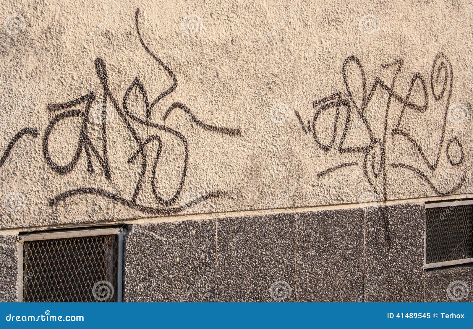 Graffiti on Side of Building Stock Image - Image of vandalism, brownish ...