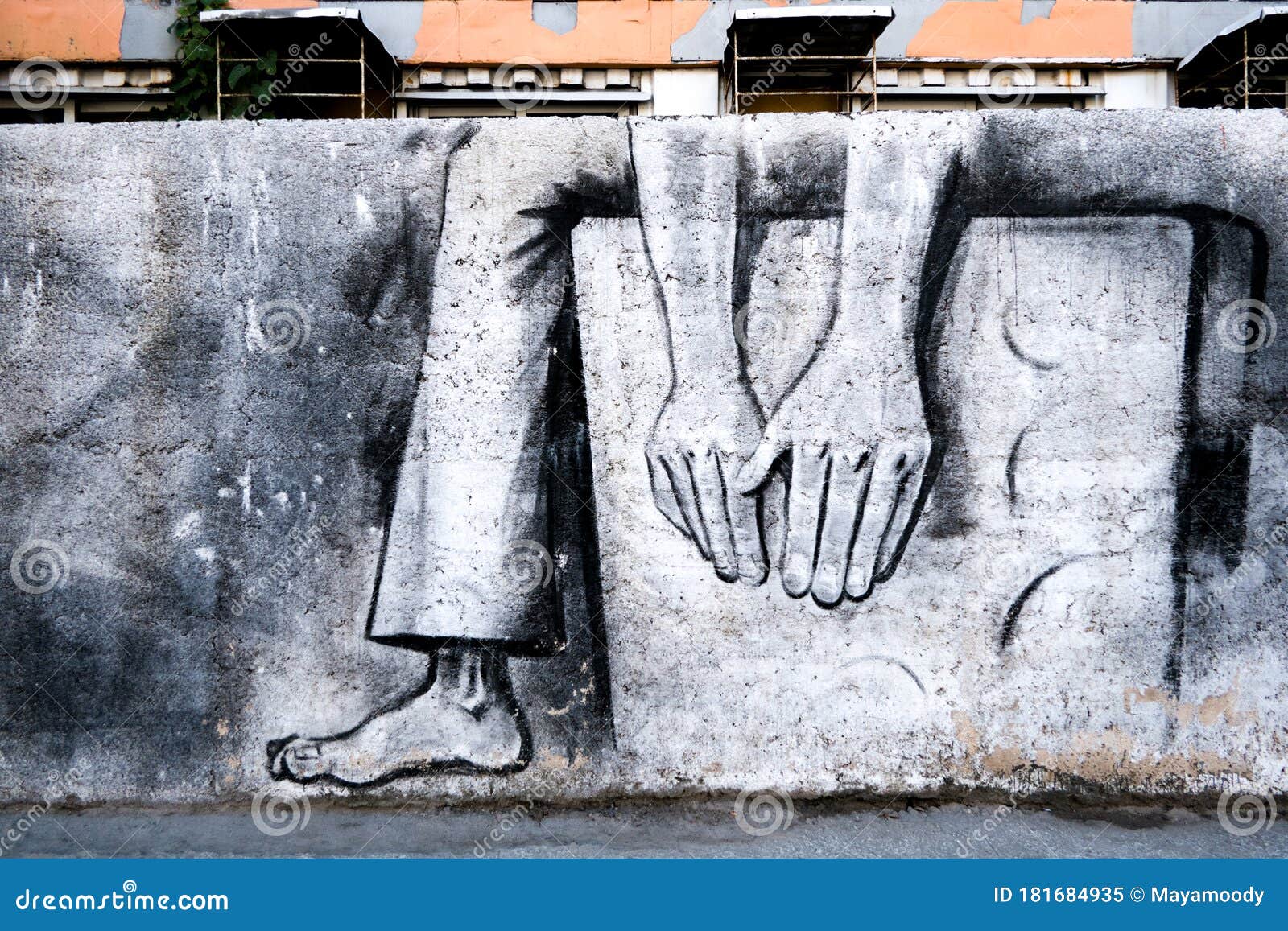 Graffiti Art Of Two Hands Holding A Circular Symbol Painted Red ...
