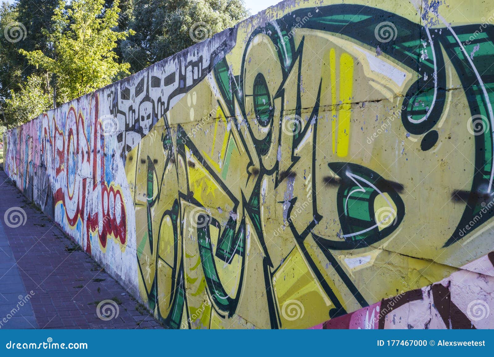 Graffiti on a stone wall editorial image. Illustration of colorful ...