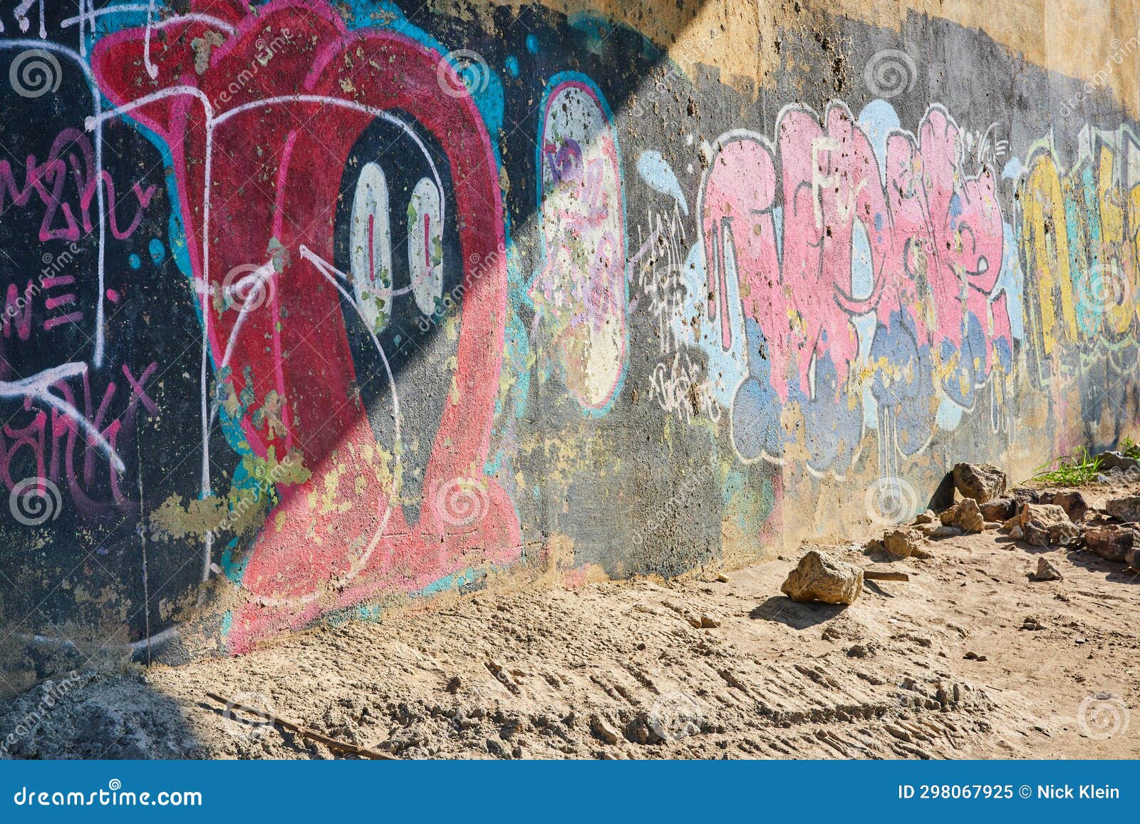 Graffiti on Sunny Wall with Construction Dirt on Ground Maumee River ...