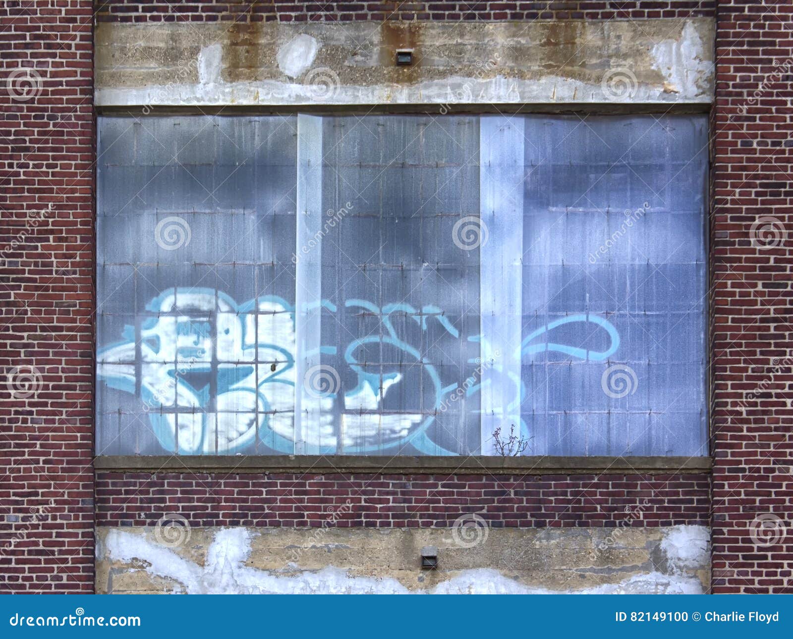 Graffiti on Windows of Abandoned Building Stock Photo - Image of ...
