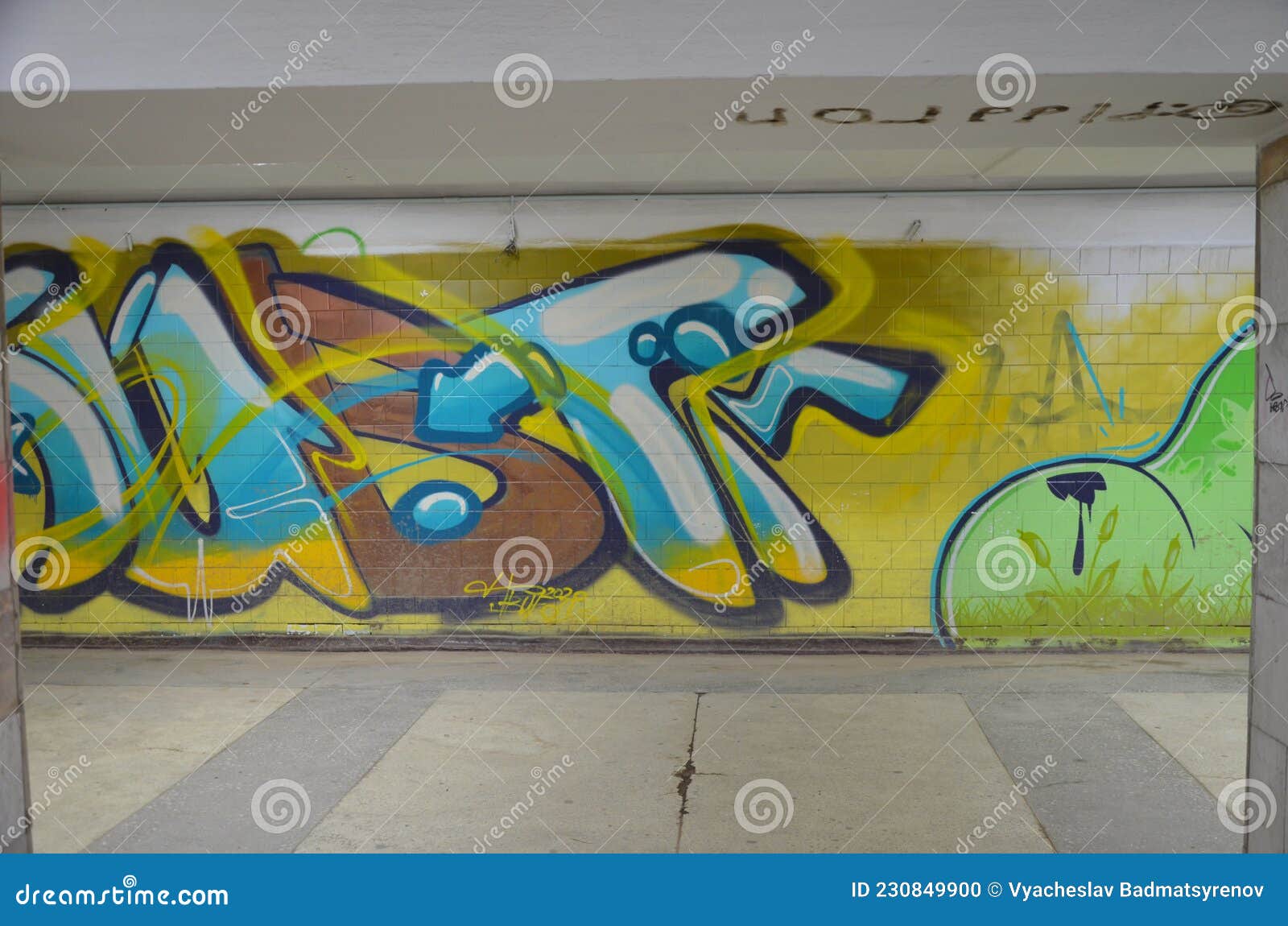 A Graffiti with Yellow Letters on a Wall Editorial Image - Image of ...