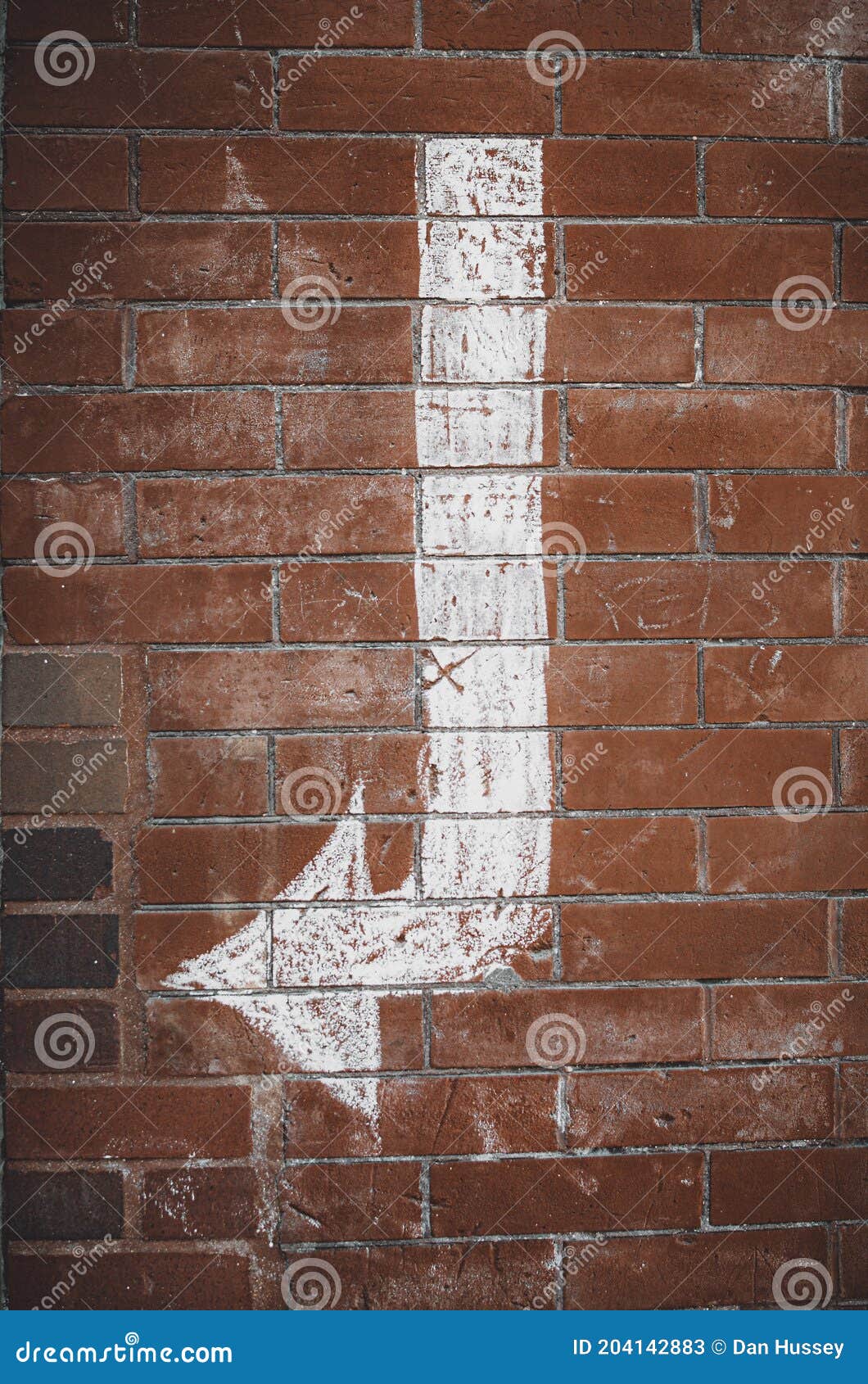 Graffiti Turn Arrow on a Brick Wall Stock Image - Image of brickwork ...
