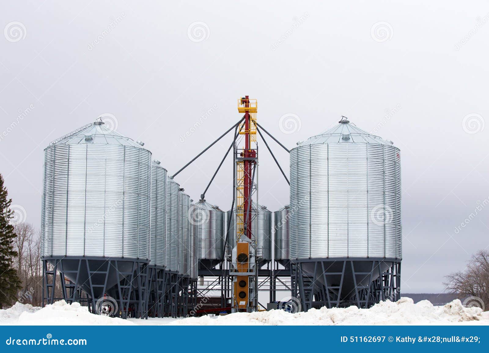 Grain auger and steel bins stock image. Image of auger - 51162697
