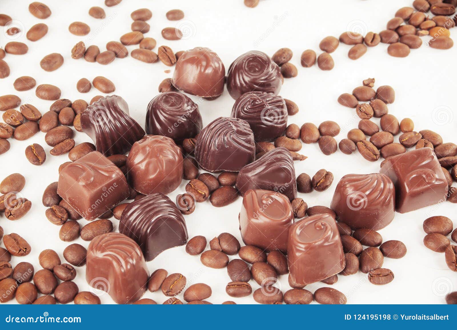 Grain Black Coffee and Chocolate Candy on a White Background Stock ...