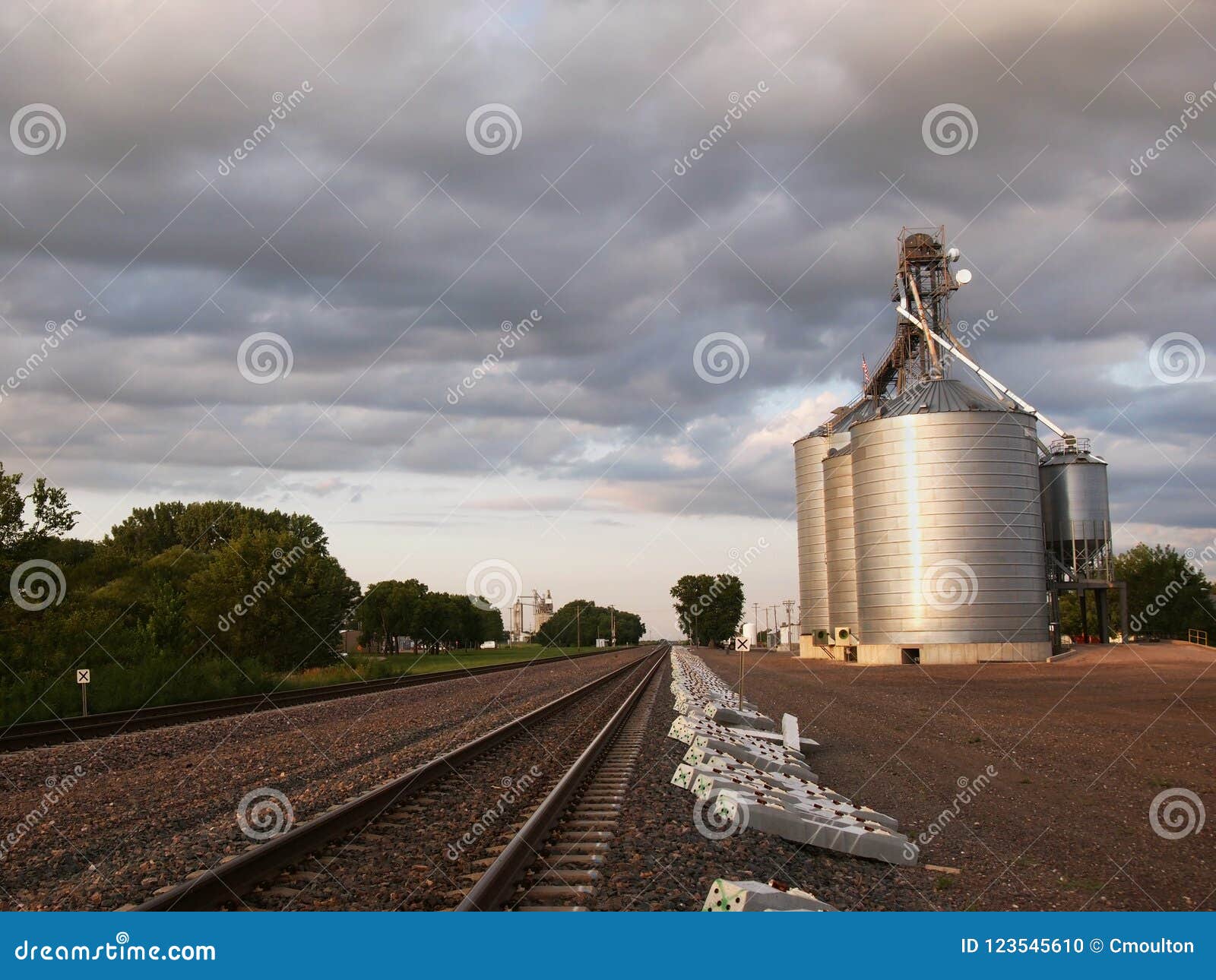 Grain Elevator by the Train Tracks Stock Photo - Image of midwest ...
