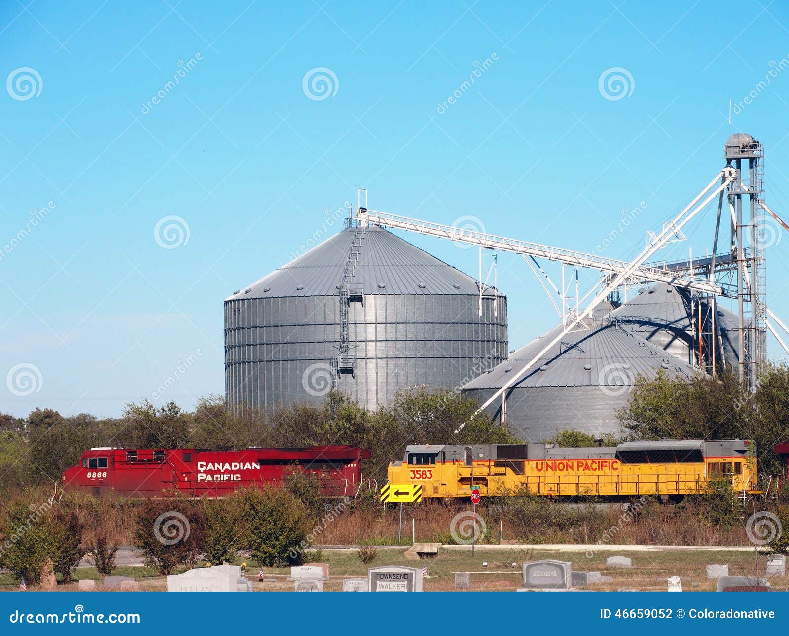 Grain Elevator and Train Locomotives Editorial Photography - Image of ...
