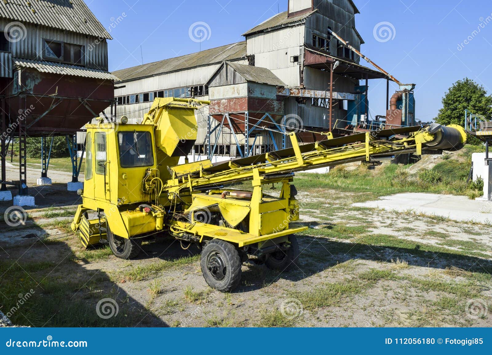 The Grain Loader is Yellow Near the Grain Terminal Stock Photo - Image ...