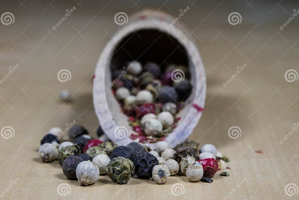 A Grain of Pepper on a Kitchen Table. Ground Pepper in a Kitchen Stock ...