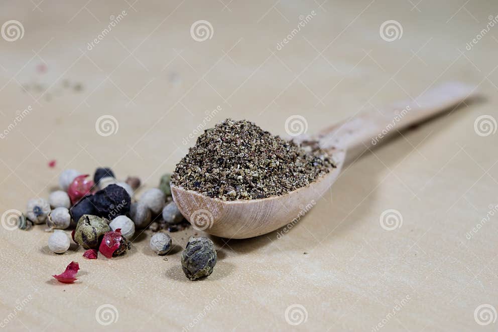 A Grain of Pepper on a Kitchen Table. Ground Pepper in a Kitchen Stock ...