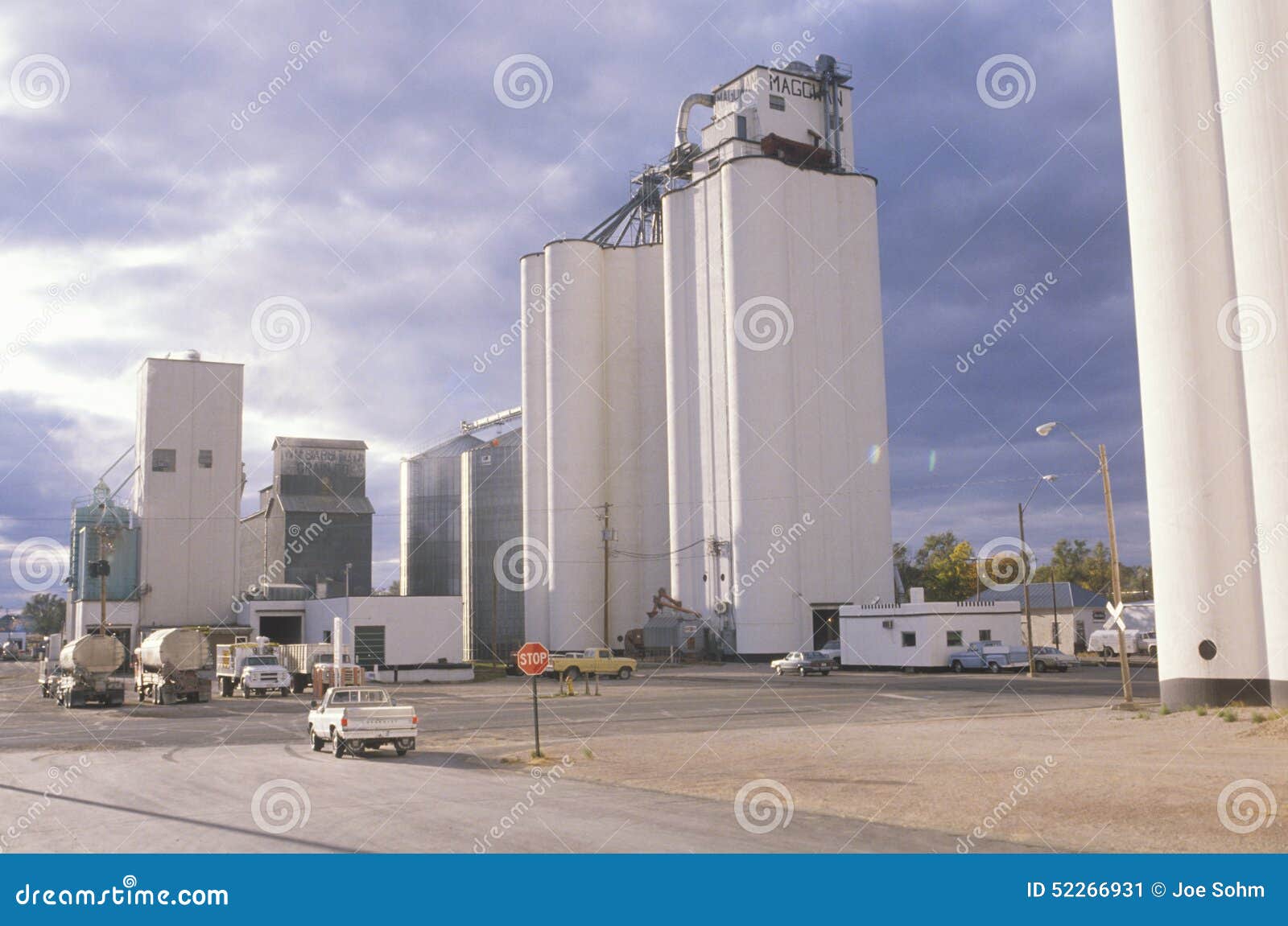 Grain Silo Co-op in KS with Cloudy Skies Editorial Photo - Image of ...
