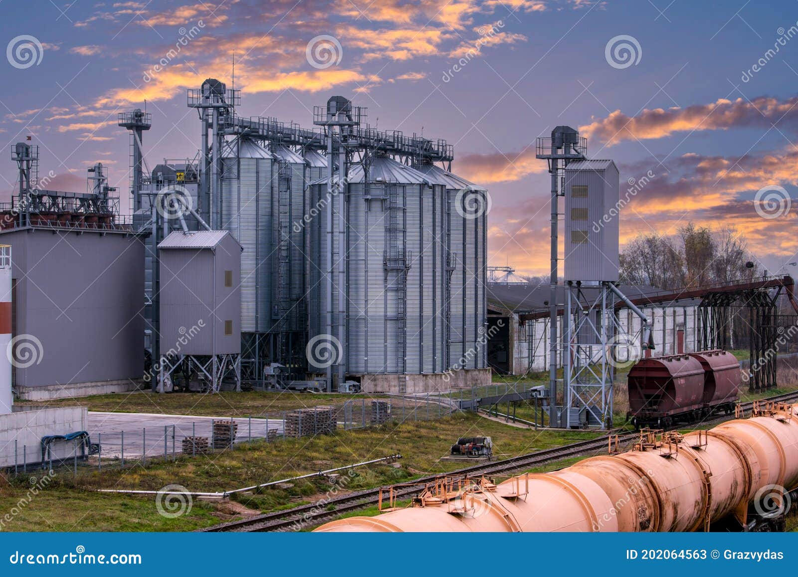 Grain Silo Next To Railroad Tracks Stock Image - Image of metal ...