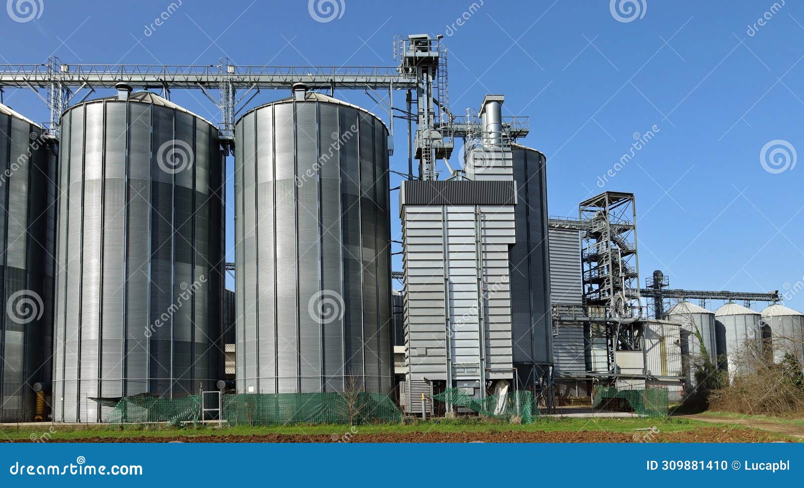 Grain Storage Bins with Silos and Elevator Tower in the Countryside ...