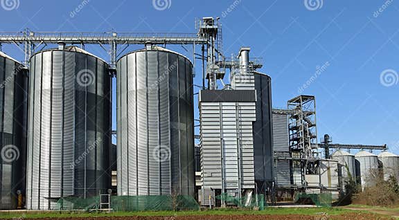 Grain Storage Bins with Silos and Elevator Tower in the Countryside ...