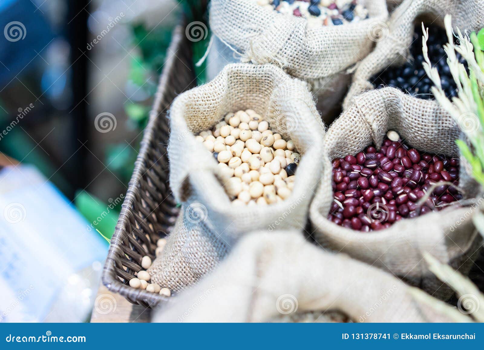 Grains, Beans, Grains and Rice in a Calico Bag on a Wooden Table Stock ...